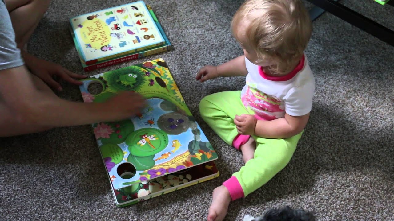 Toddler Plays with Usborne Pull Back Ladybug Book - YouTube