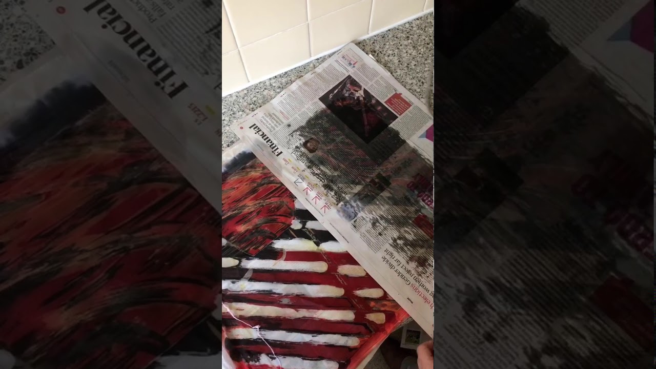 Ironing out wax from a batik - YouTube