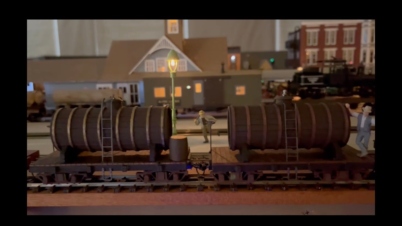 Bachmann On30 Climax with two tank cars, a flat and a caboose. - YouTube