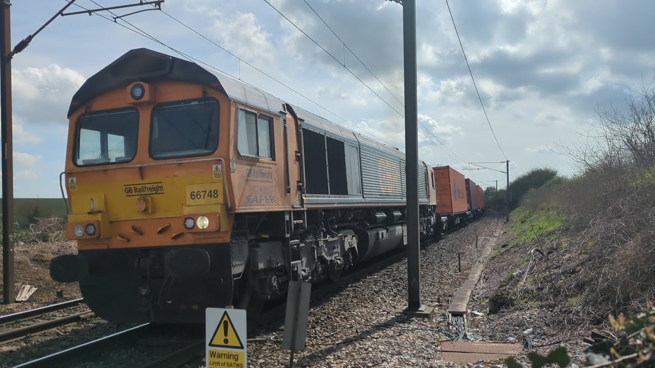66748 'West Burton 50' operating 4E21 departs Haughley Junction at 13: ...
