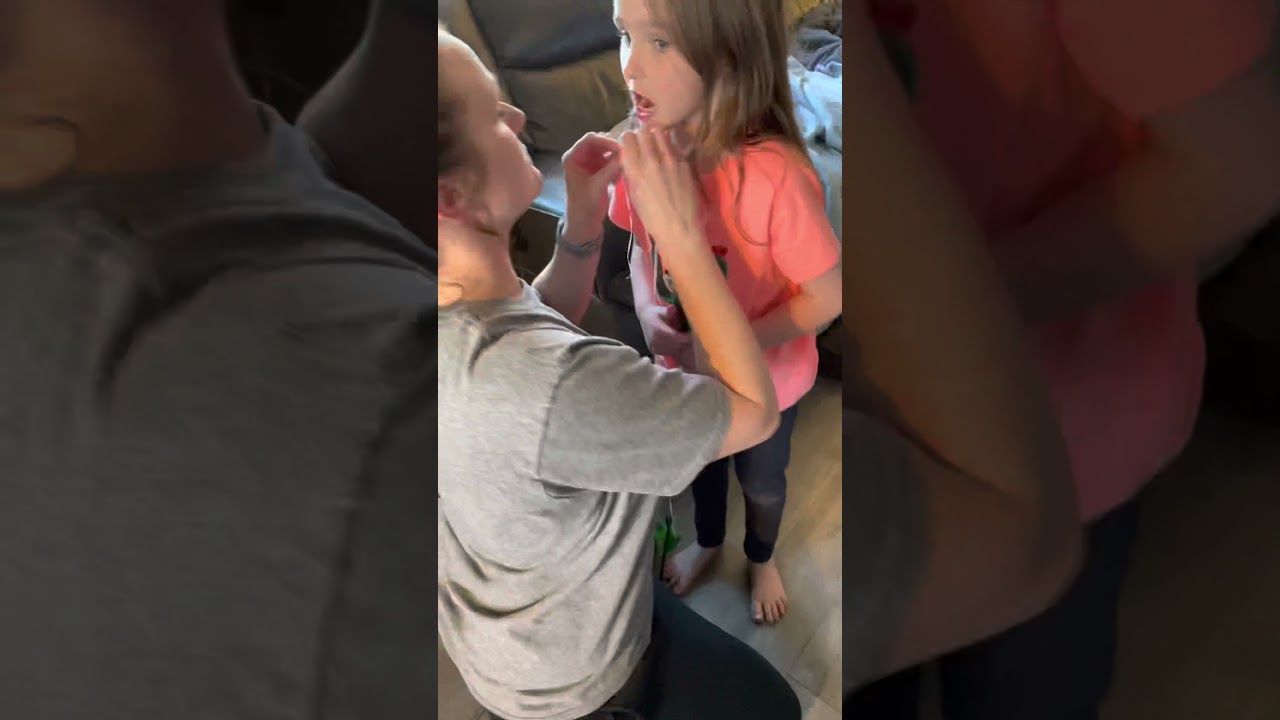 How Too Pull a Loose Tooth Out With String - YouTube