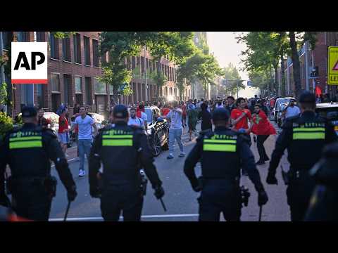 Morocco fans clash with police in the Netherlands after World Cup win