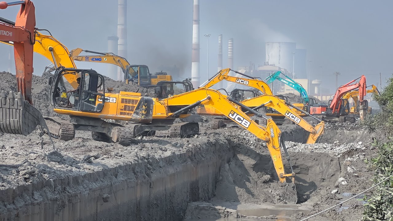27 Excavator digging Power Plant Water Trench Flooded Mud Filled ...
