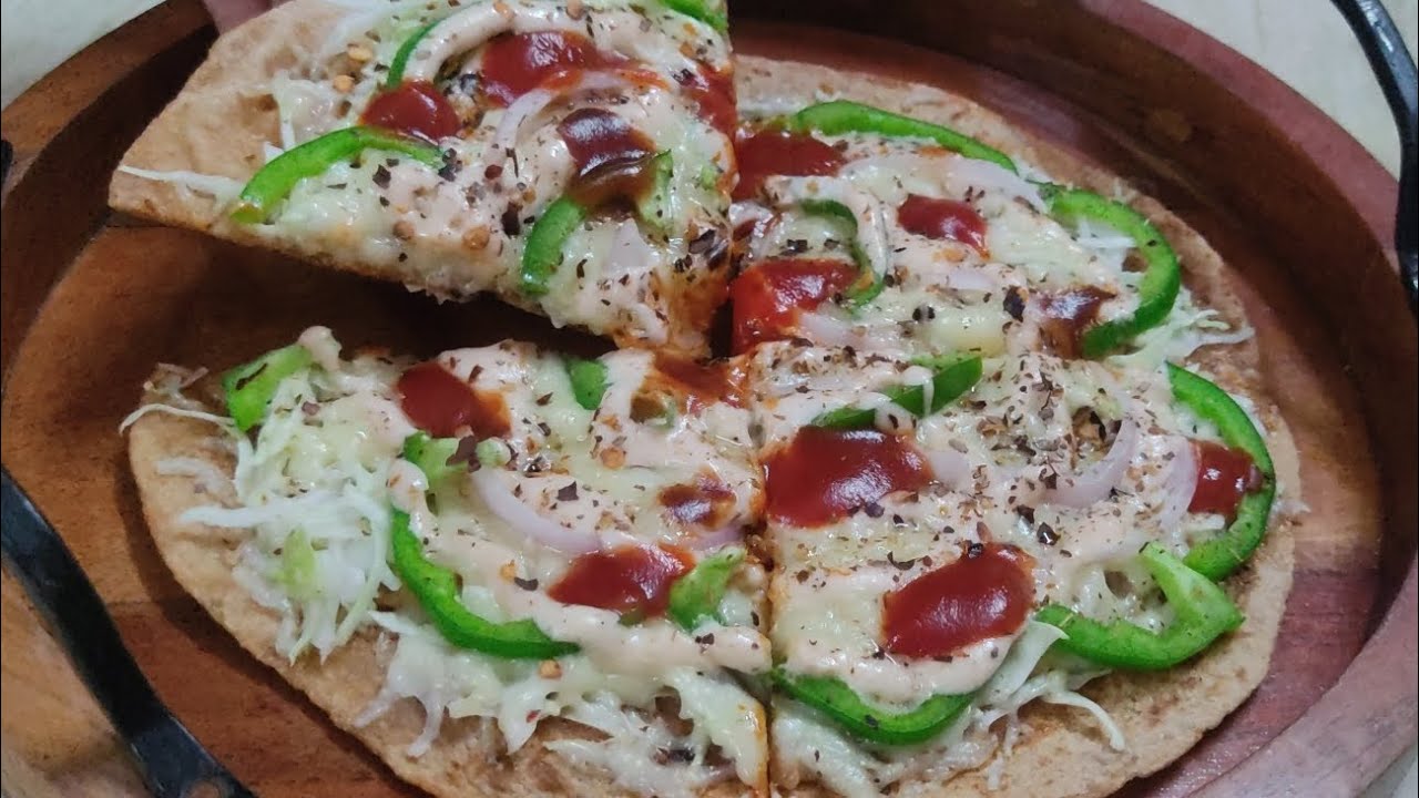 Thin crust roti pizza 🍕 using leftover roti | Leftover roti pizza🍕 ...
