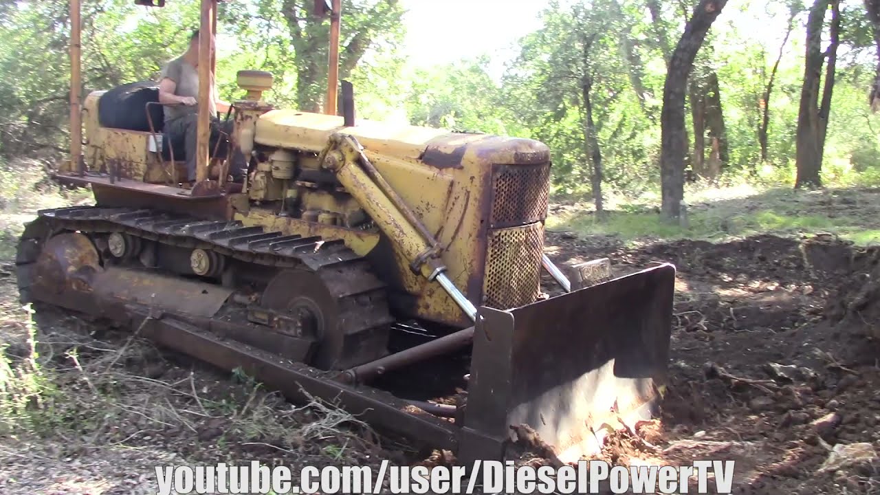 CAT D6 PUSHING DIRT AWAY FROM TREE!!! PART 2 - YouTube