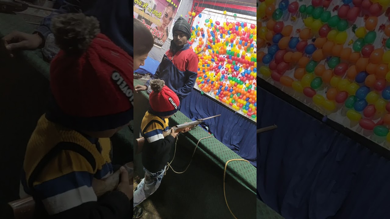 How to point your Aim with Rifle. Talented kid's target on bule Balloon ...