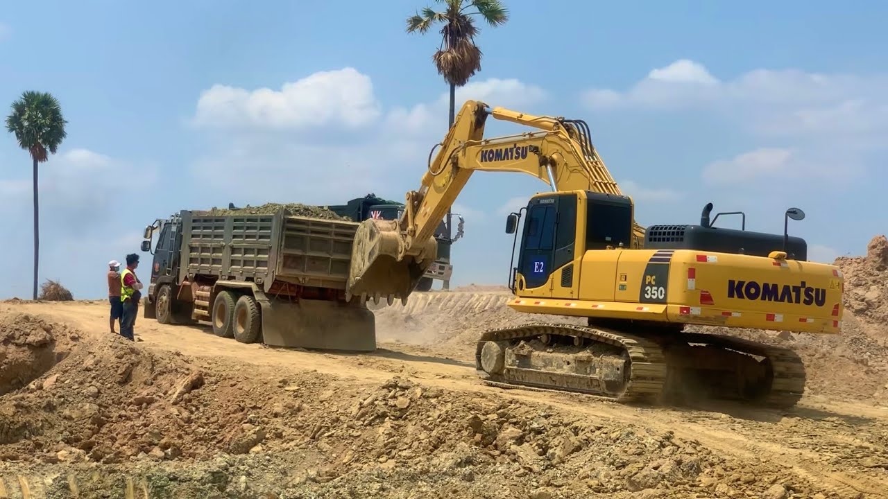 Wow! Awesome Excavator Pushing Dump Truck ...