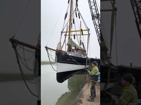 Fifie fishing boat being lifted in at Faversham