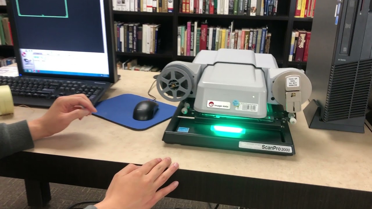How to use a microfilm machine - YouTube