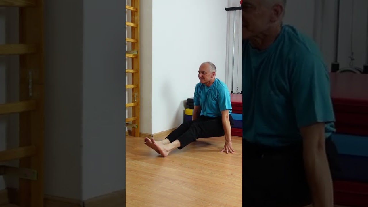 L seat on the floor in the support on the toes | 62 years old man ...