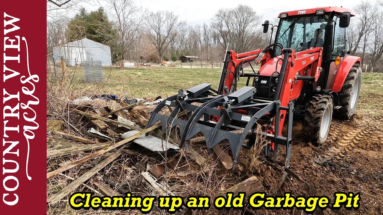 Digging out an old garbage pit we found on our property. - YouTube