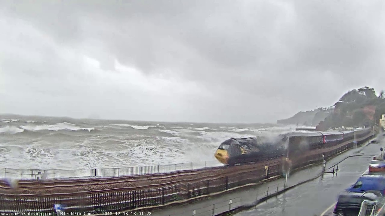 Train passes and storm waves 18122018 - YouTube