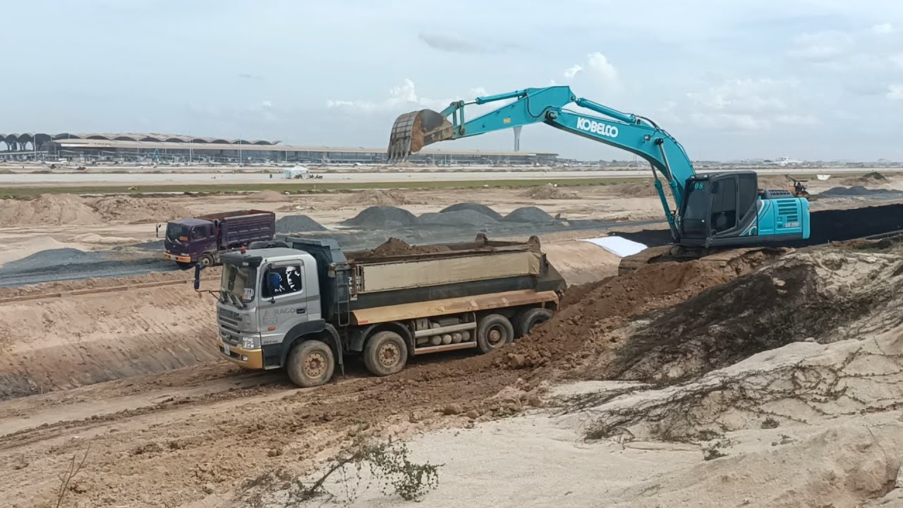 New video of digging a canal of excavator kobelco and dump truck - YouTube