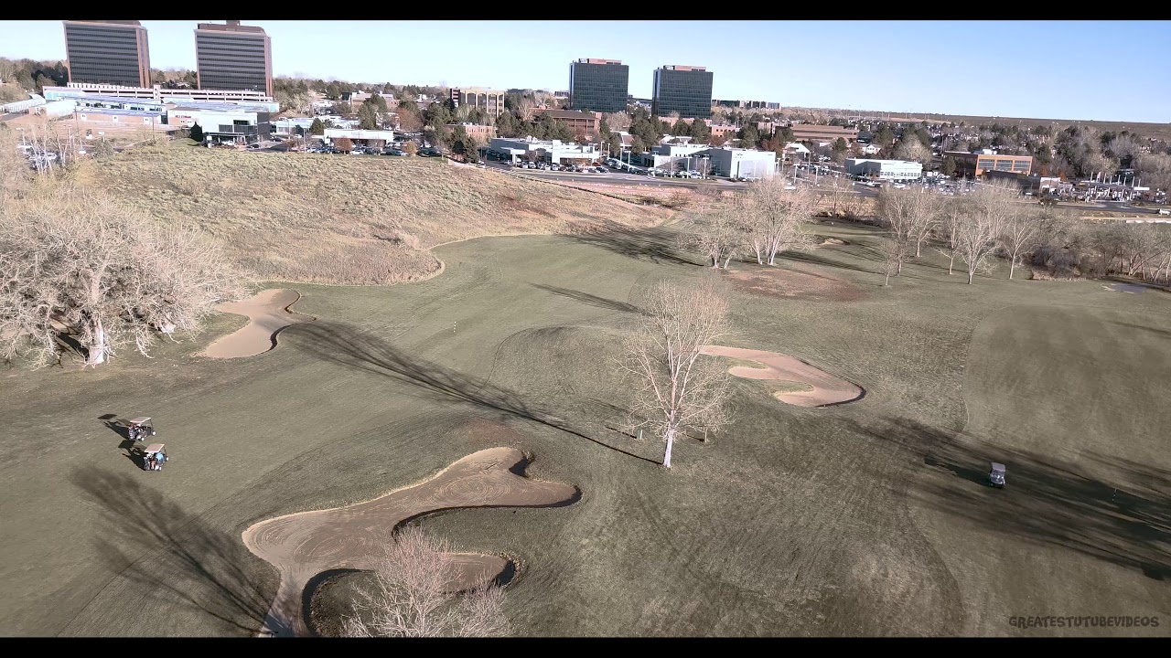 Drone over a park and river - YouTube