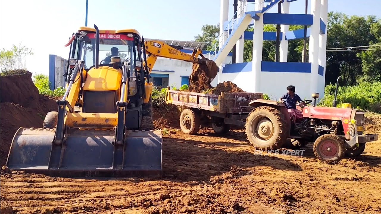 New Jcb 3dx Backhoe Loader Machine Loading Red Mud In Massey Ferguson ...