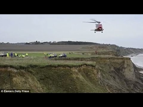 UNBELIVEABLE moment woman was rescued from sinking into deep mud full ...