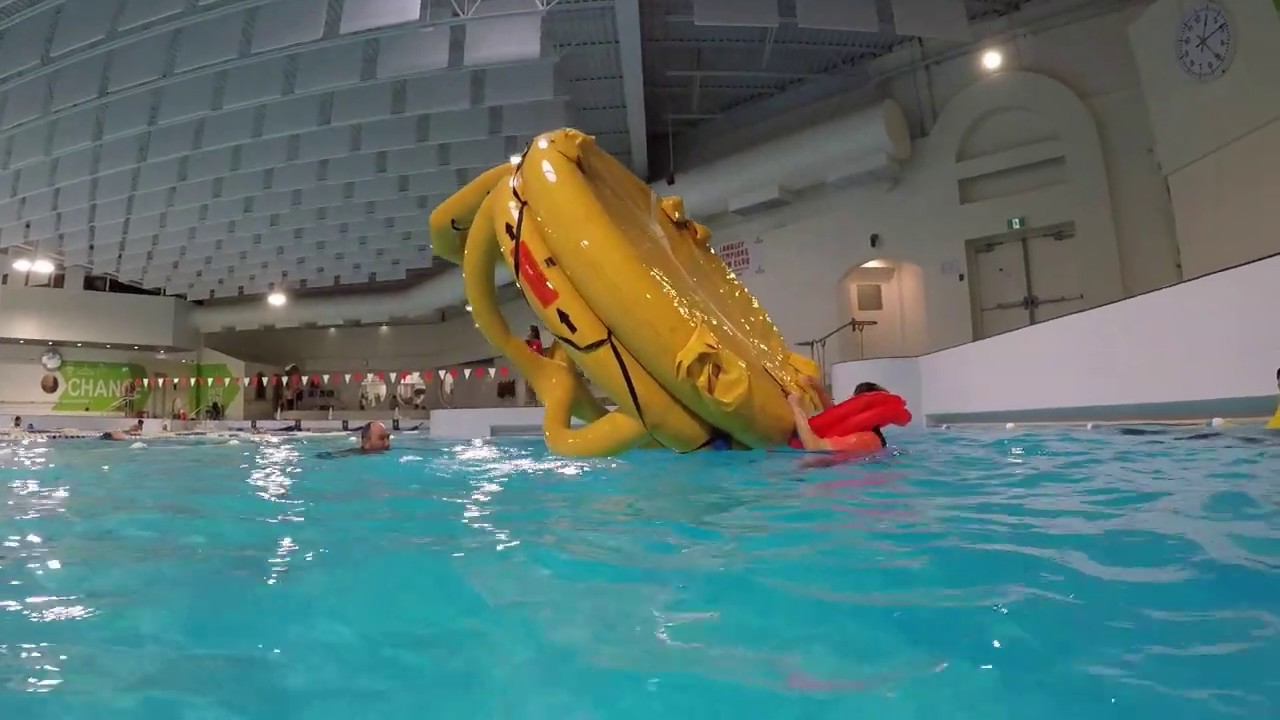 How to flip a life raft - YouTube