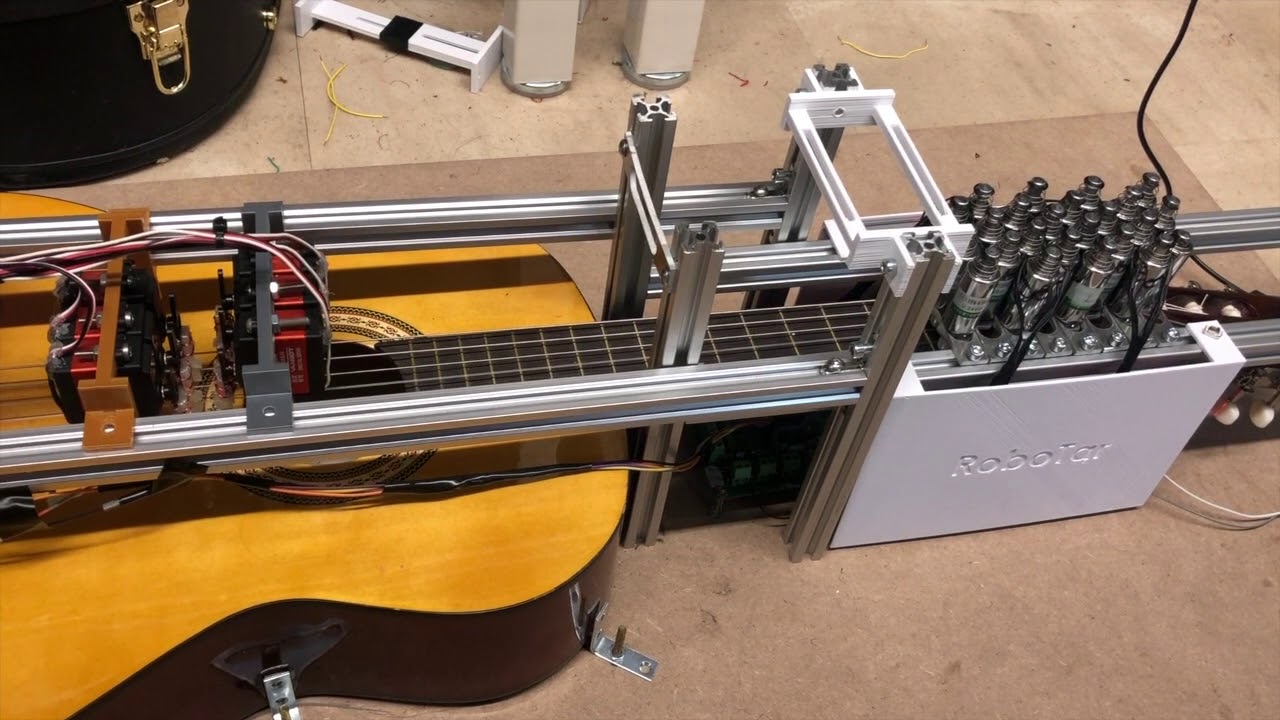 Automatic guitar playing robot - YouTube