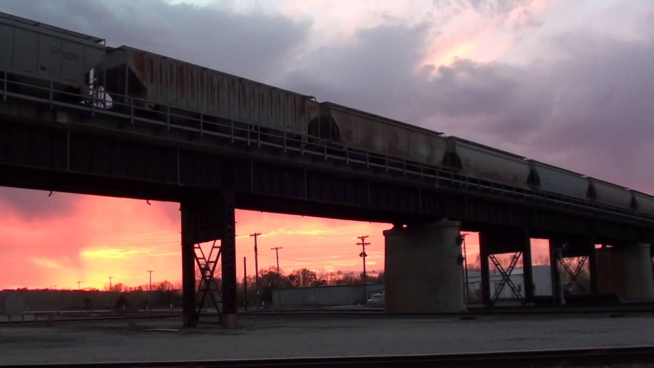 UP Grain Train at sunset with Southern Pacific and CNW at Santa Fe ...