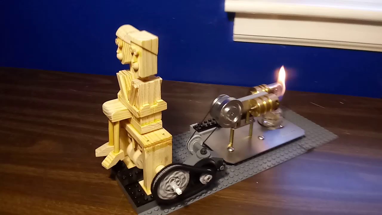 Stirling engine powered wooden kissing couple automata - YouTube