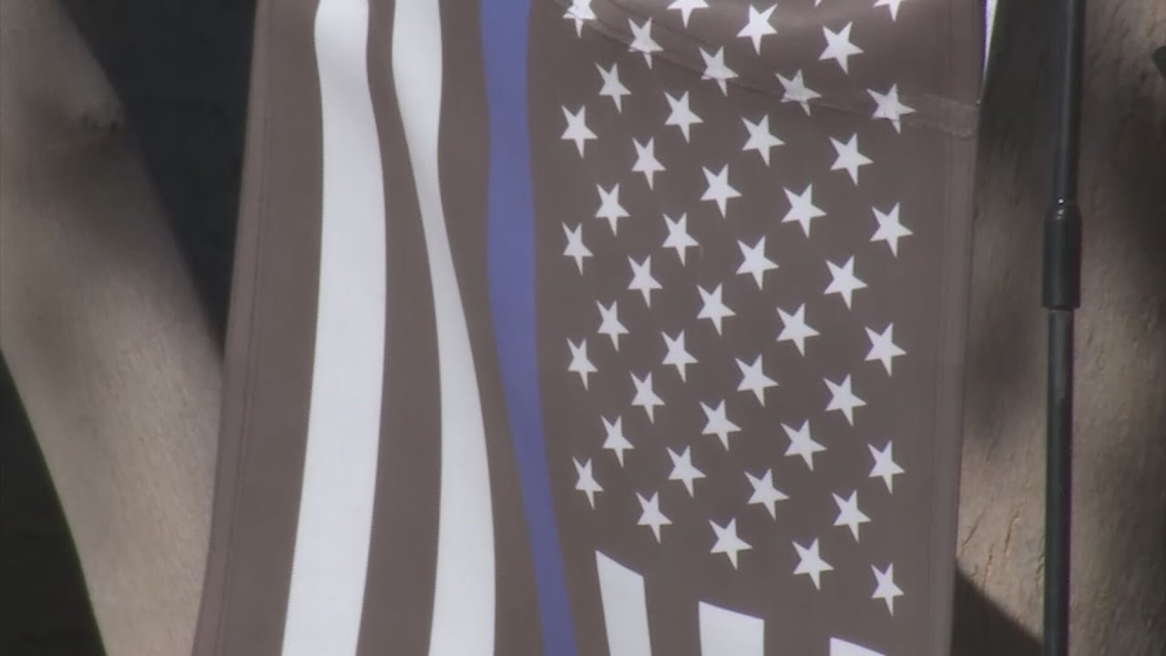 New law will allow more flags to be flown in HOA communities - YouTube