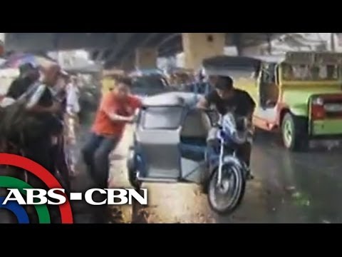 Colorum tricycle drivers back in Manila - YouTube