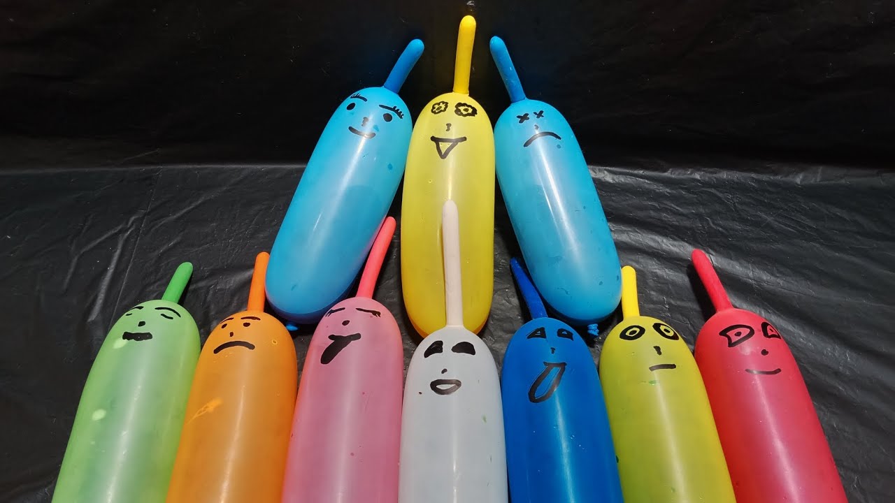 Colorful balloon emit colored liquid - YouTube