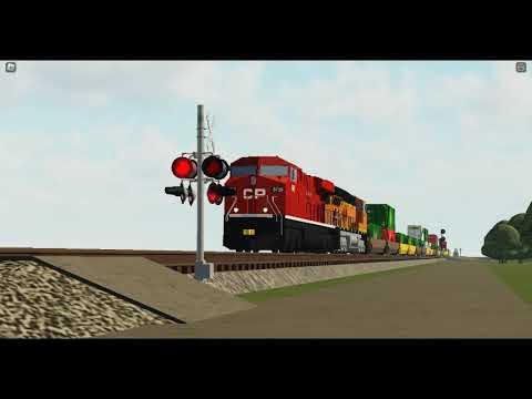 CPKC INTERMODAL TRAIN PASSES BY THE CROSSING - YouTube