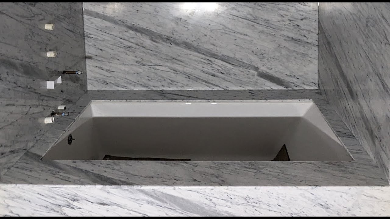 Marble slab installation job in bathroom NYC - YouTube