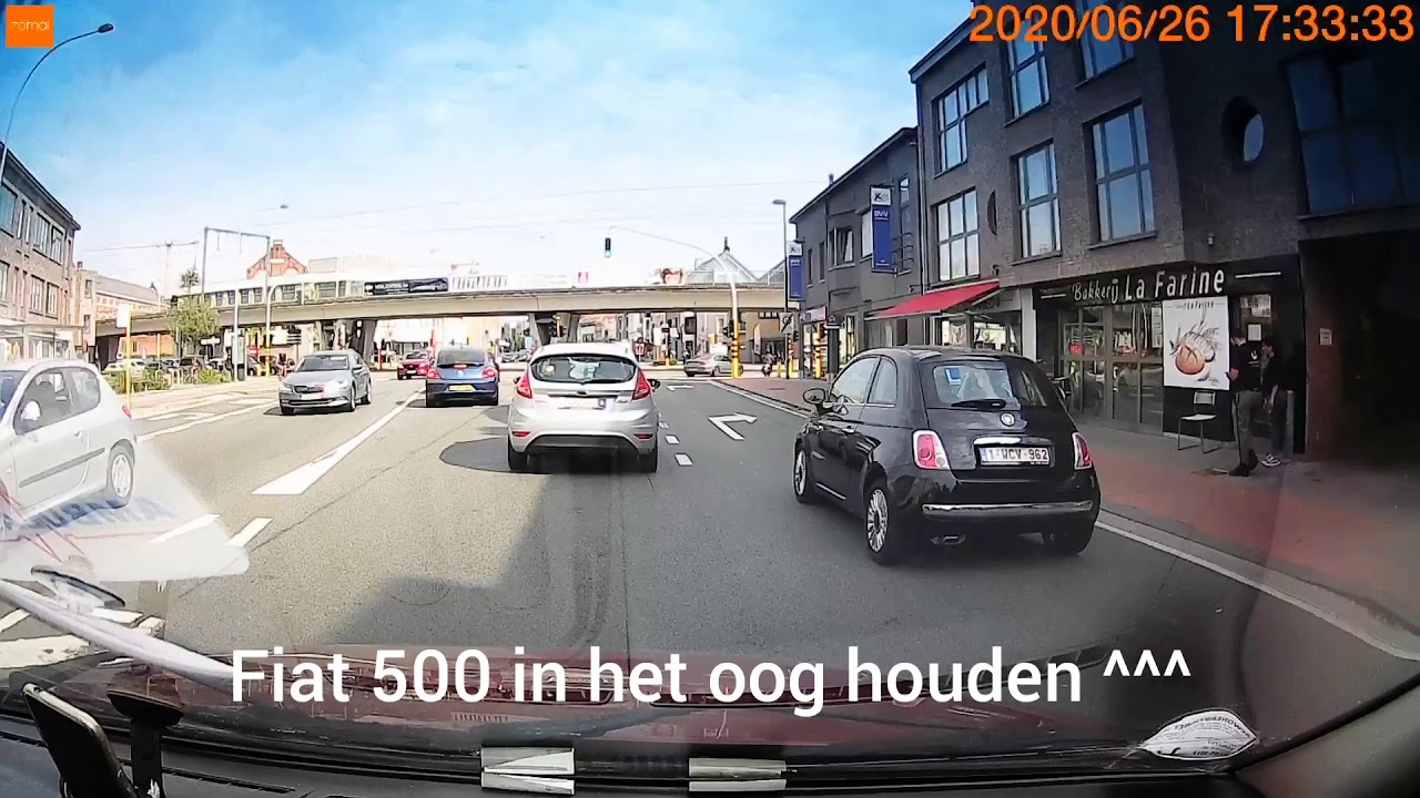 Car comes out of garage, driver ignores roadmarkings ... - YouTube