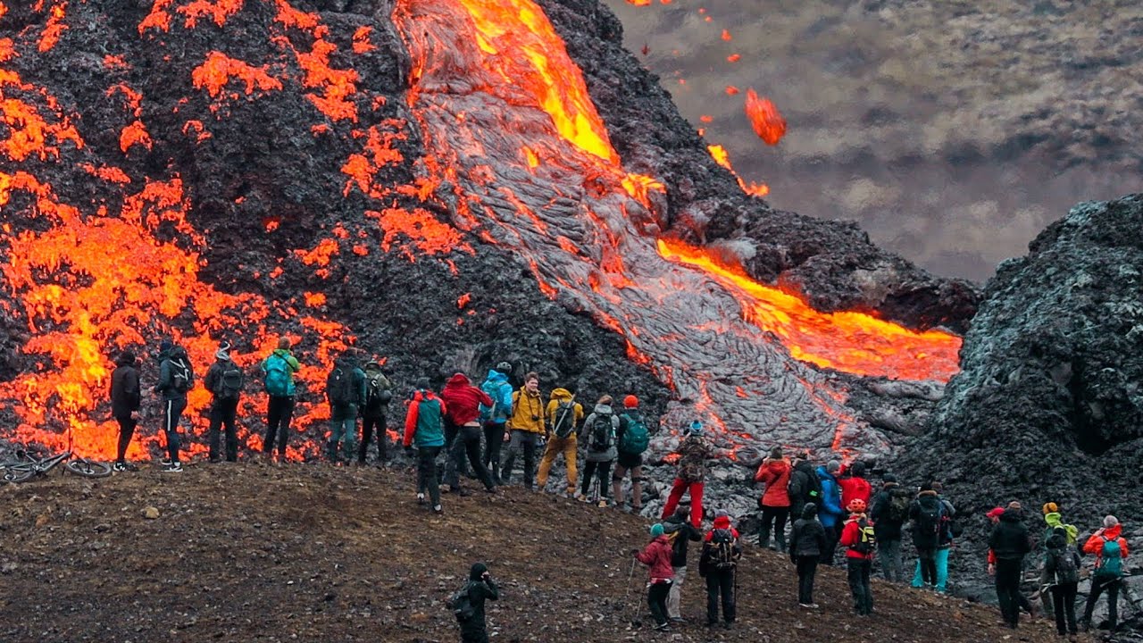 CURIOUS PEOPLE ARE GETTING TOO CLOSE TO AN ACTIVE VOLCANO! LAVA SPEWING ...