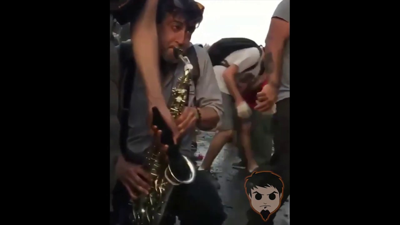Guy Plays Saxophone at Riot - Battle Cry - YouTube