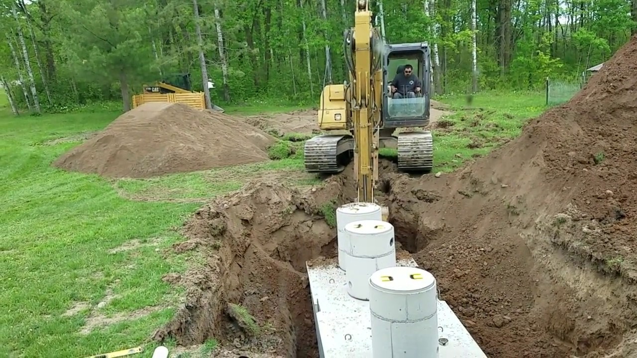 new septic system part 8 starting to dig the drain field - YouTube