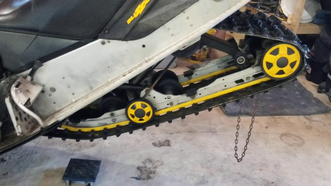 Skidoo Rev Chassis Rear Skid Removal - YouTube