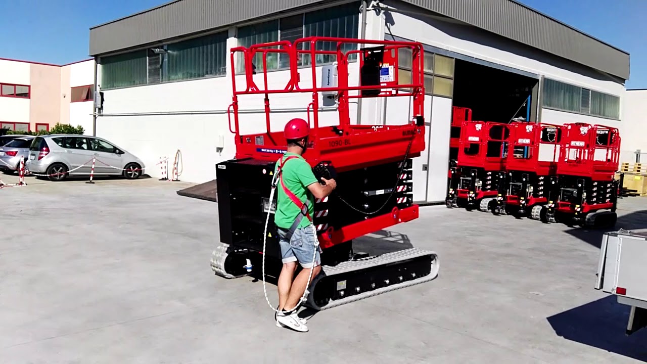 Almac self levelling crawled scissor lift Easy Access Getting in - YouTube