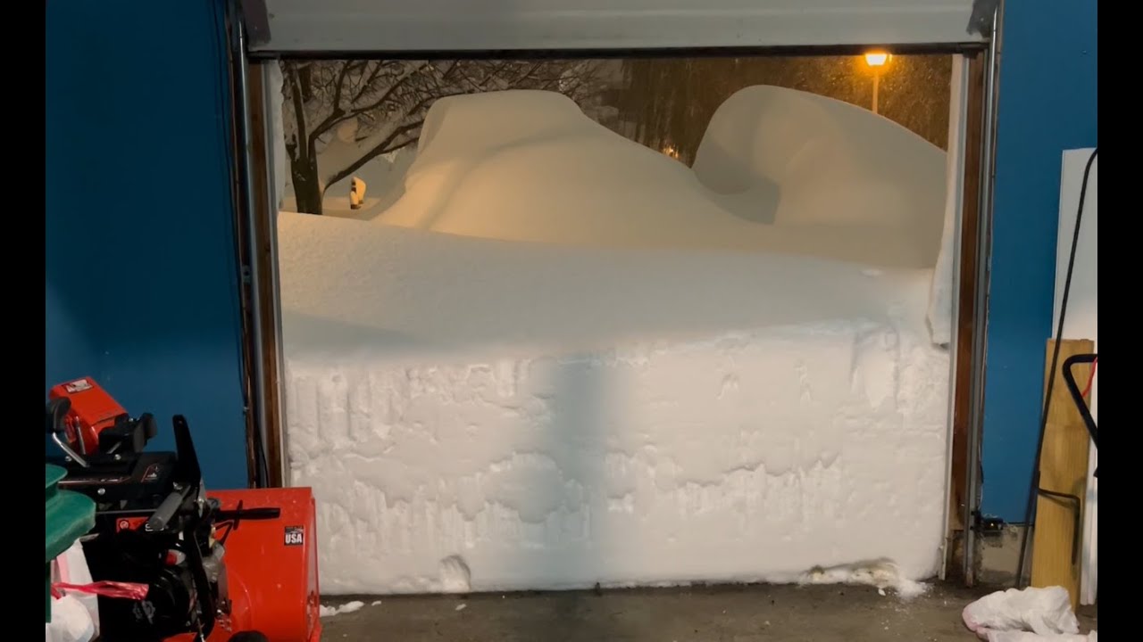 Man Opens Garage Door to Reveal Wall of Snow - YouTube