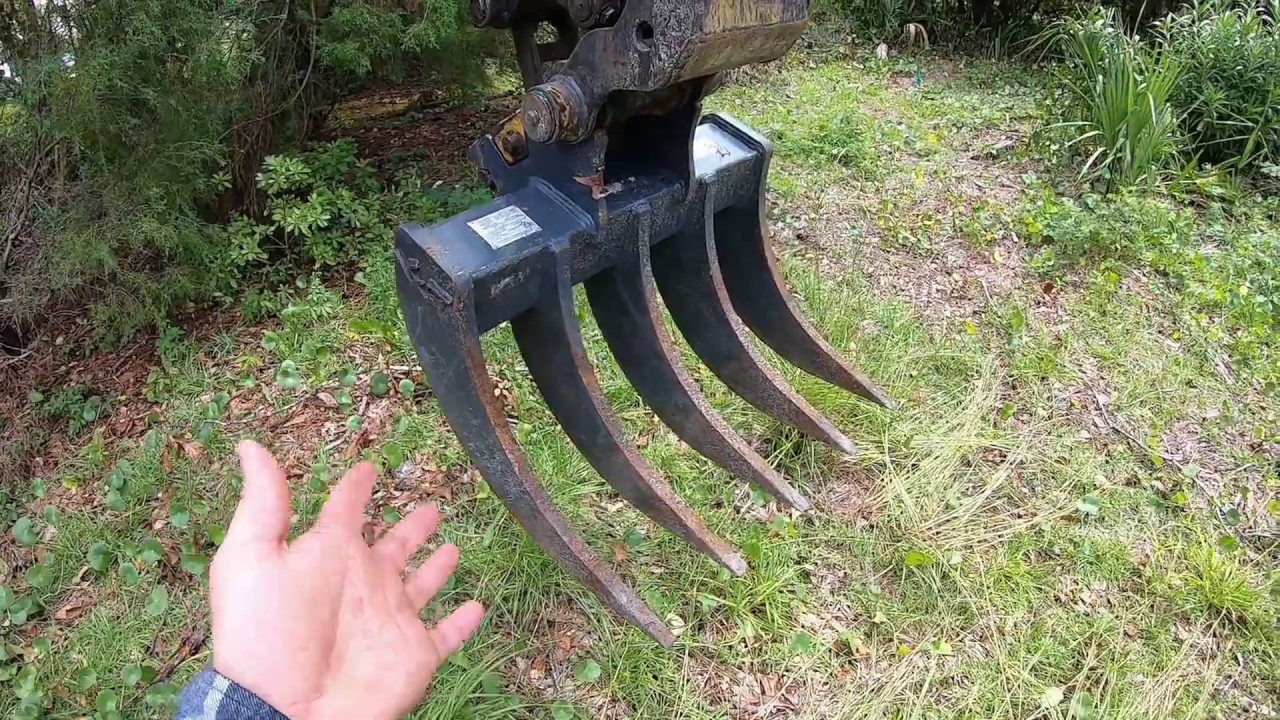 "Fang Rake" by Leading Edge Attachments on John Deere 35D - YouTube