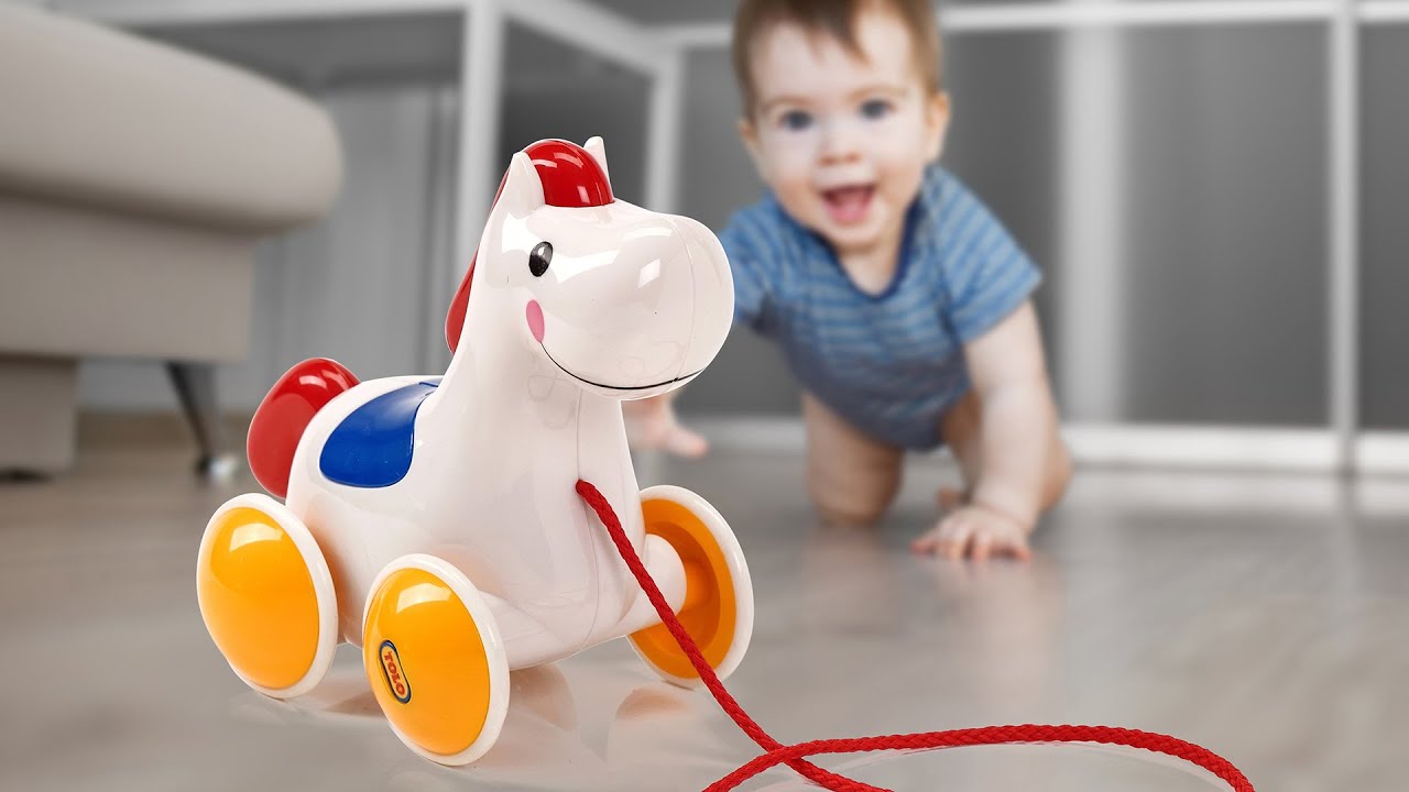 TN89500 TOLO Pull Along Pony - YouTube