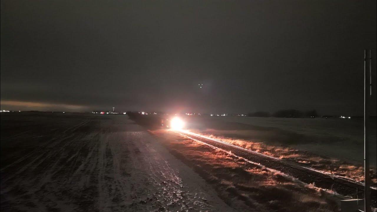 Drone video of southbound UP tanker train at night on the Spine Line - YouTube