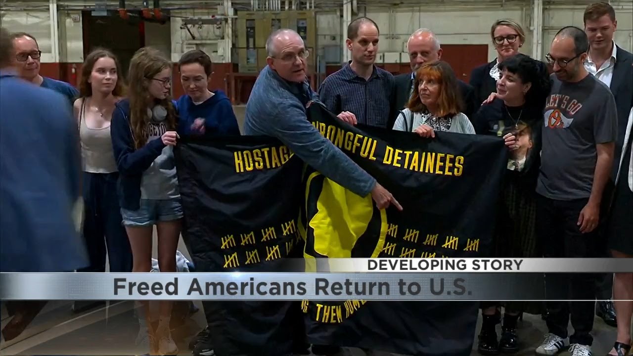 Wrongfully detained Americans return home from Russian prison - YouTube