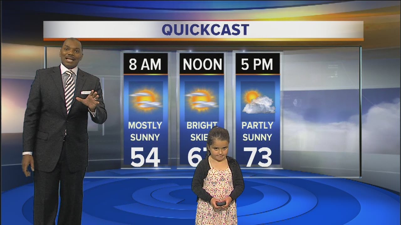 Meteorologist Keenan Smith has a little help with weather this morning ...