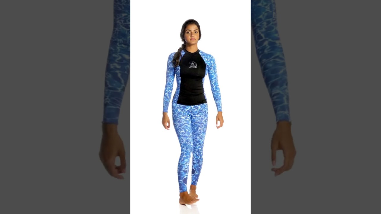 Xcel Women's Ocean Ramsey UV 6oz. Long Sleeve Rashguard w/ Key Pocket | SwimOutlet.com - YouTube