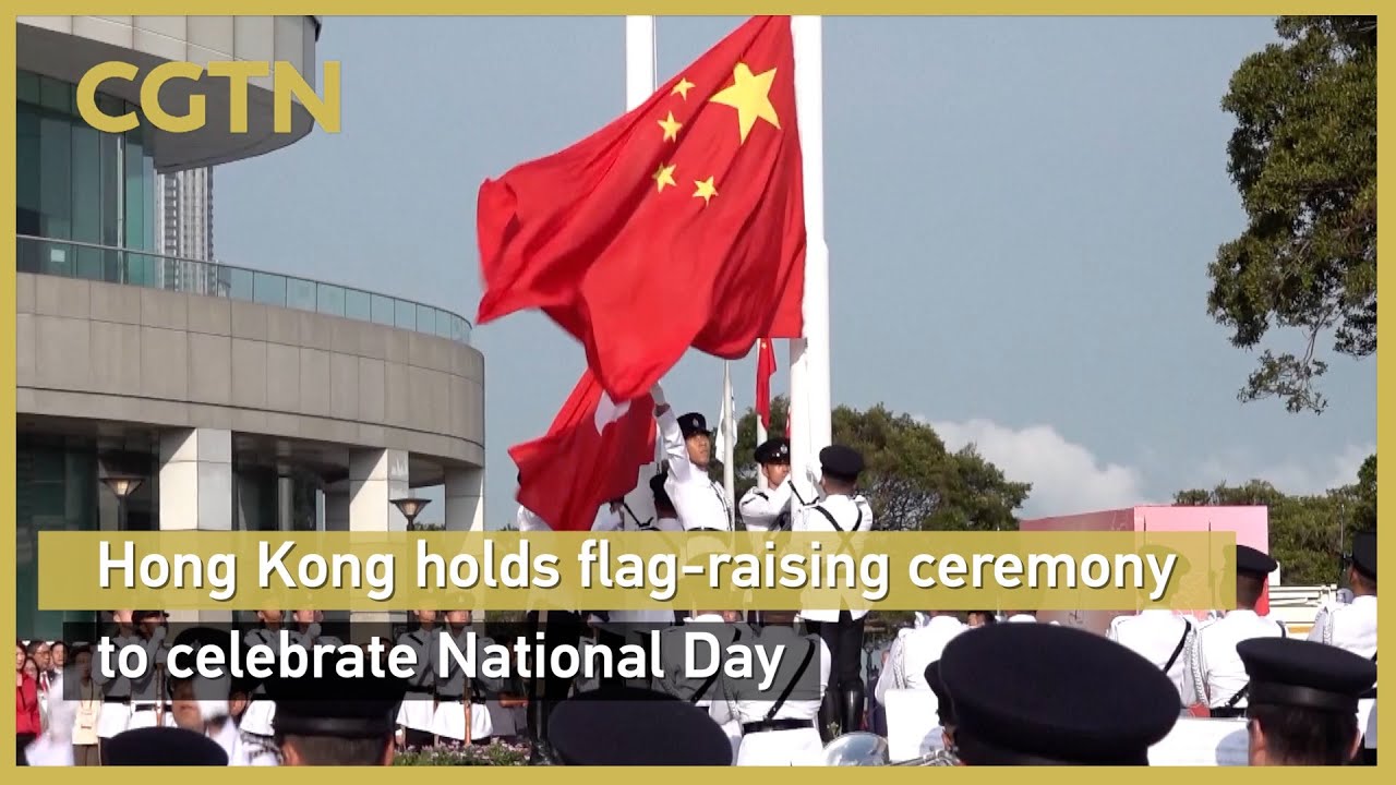 Hong Kong holds flag-raising ceremony to celebrate National Day - YouTube