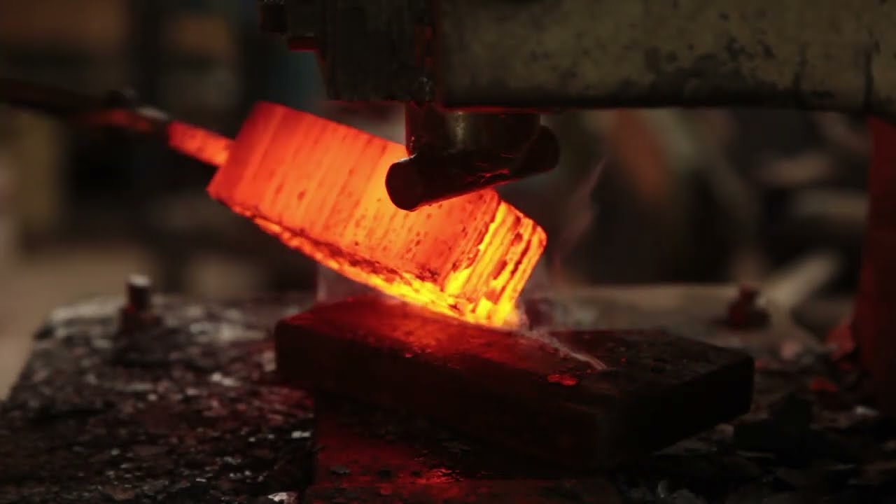 Forging a Damascus billet - YouTube