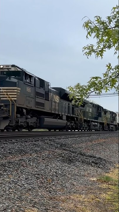 NS 1166 SD70ACE leads NS 22X through Manville NJ 5/2/2023 #ns #railroad #railway #shorts # ...
