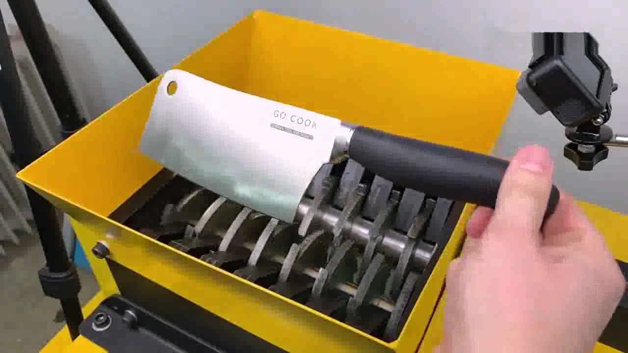 Enerpat shredder machine is working for shredding iron plates and metal ...