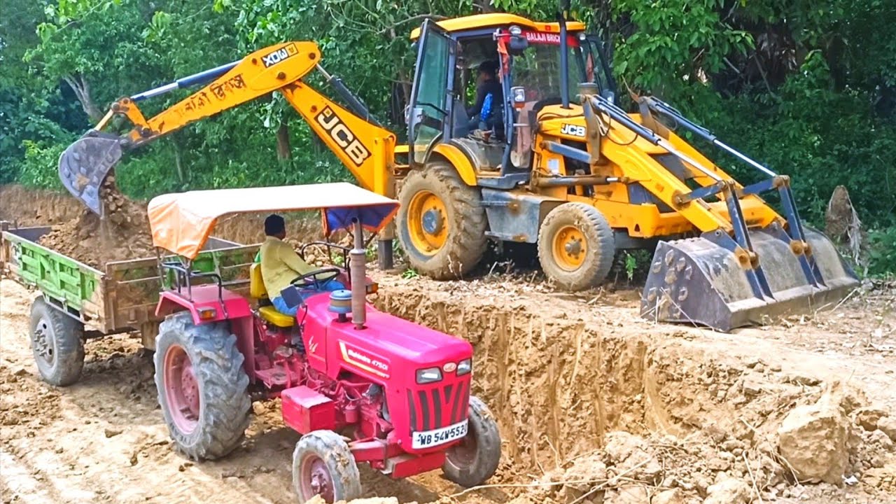 New Jcb 3dx Backhoe Loader Machine Loading Red Mud In Mahindra 475 DI ...