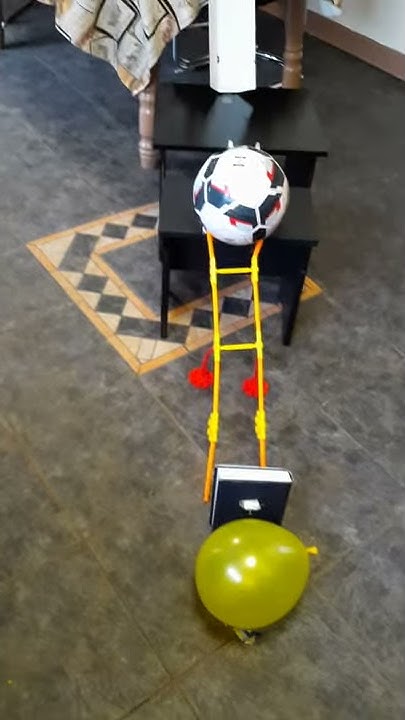 Rube Goldberg Machine, popping a balloon - YouTube