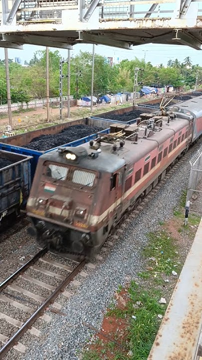 12510 - GHY - SMVT EXPRESS Crossing With Goods Train On Parallel Side - YouTube