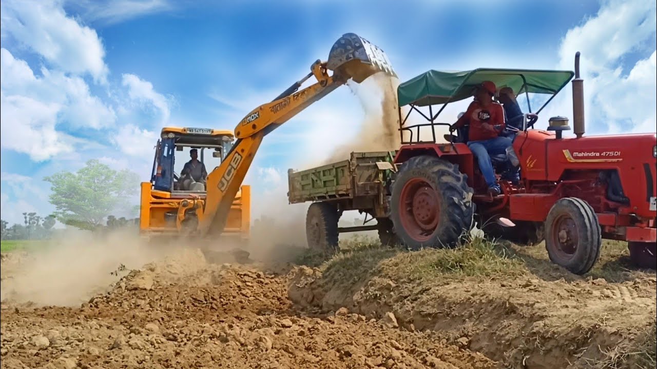 Jcb 3dx Backhoe Loader Machine Loading Red Mud In Mahindra 475 DI ...
